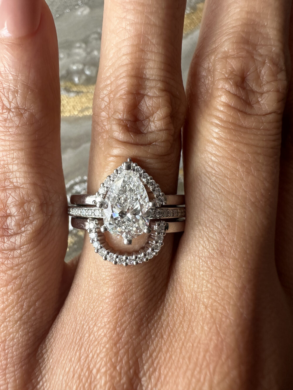 Pear Diamond Engagement Ring with Contour Bands | blingadvisor.com